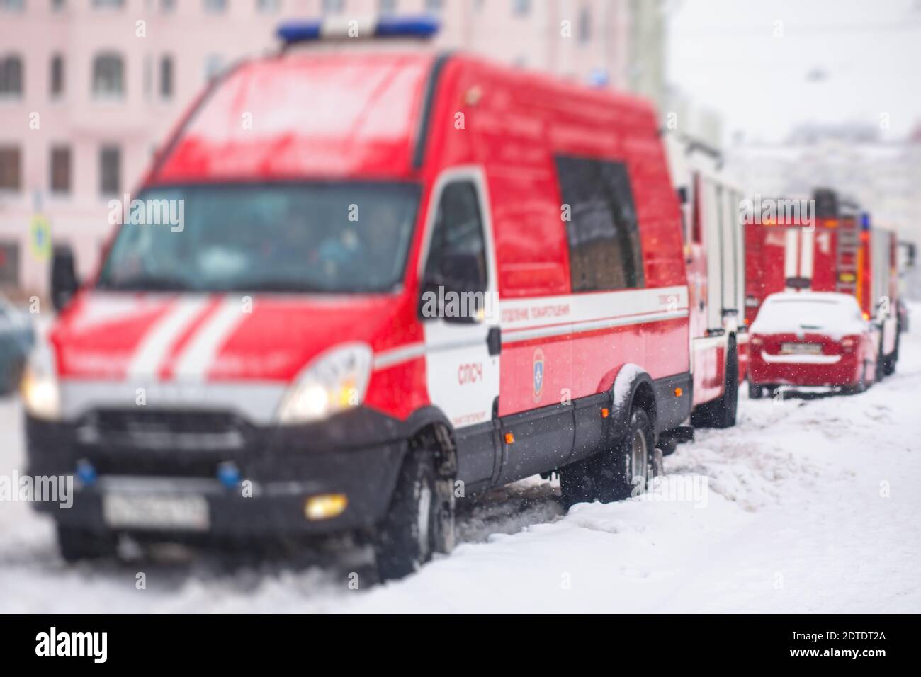 Group of fire men in uniform, firefighters with the a engine truck ...