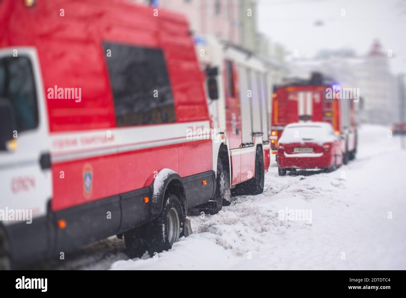 Group of fire men in uniform, firefighters with the a engine truck ...