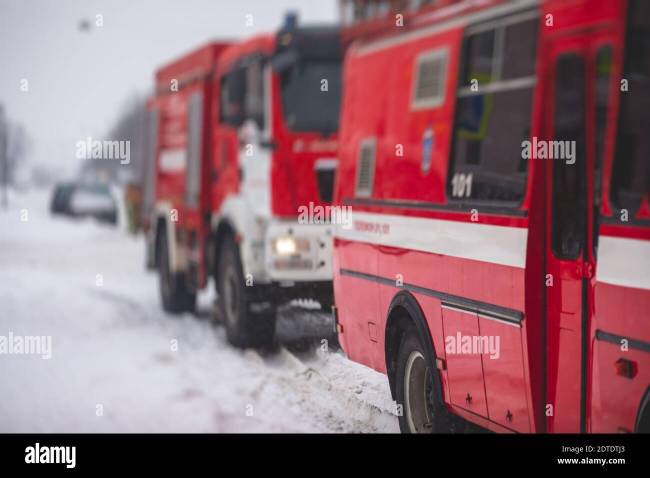 Group of fire men in uniform, firefighters with the a engine truck ...