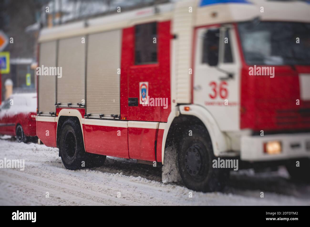 Group of fire men in uniform, firefighters with the a engine truck ...