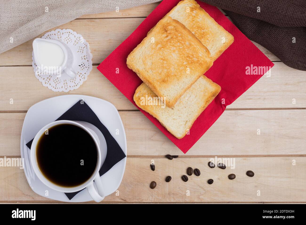 Coffee with milk and toasts on a wooden background. Screensaver ...