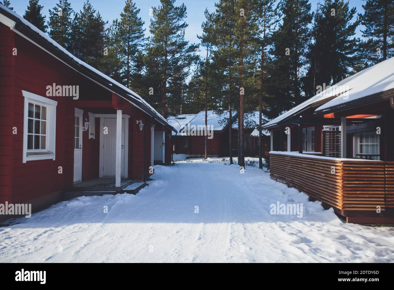 A view of cozy wooden scandinavian cabin cottage chalet house covered ...