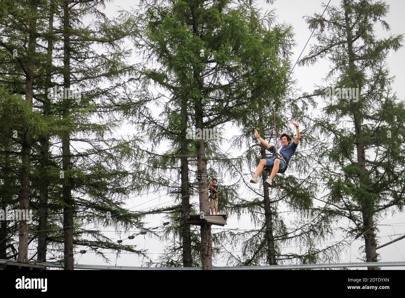 Child zip lining hi-res stock photography and images - Alamy