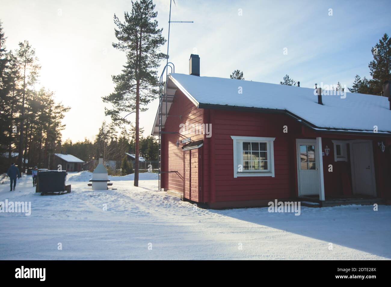 A view of cozy wooden scandinavian cabin cottage chalet house covered ...