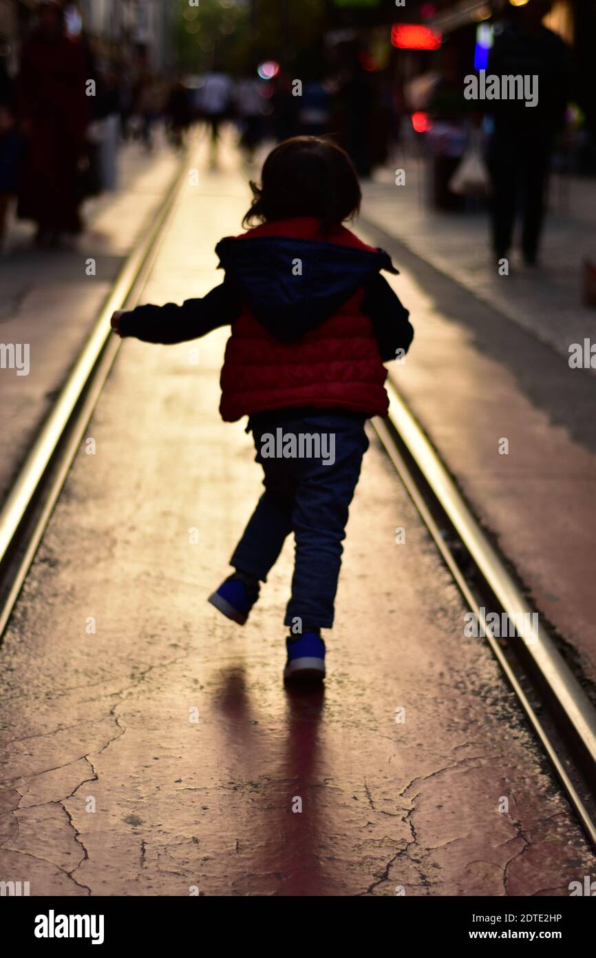 Boys running in the road hi-res stock photography and images - Alamy