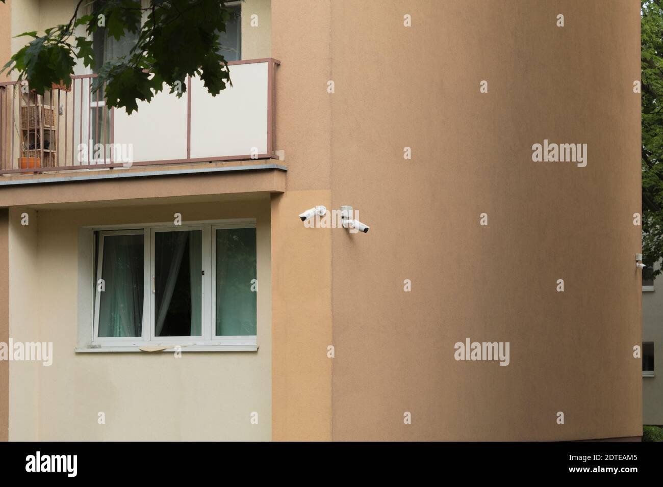 Security cameras on a residential building. Two outdoor security ...