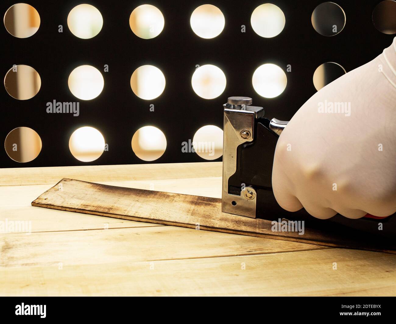 Work with a stapler and fixing boards Stock Photo - Alamy