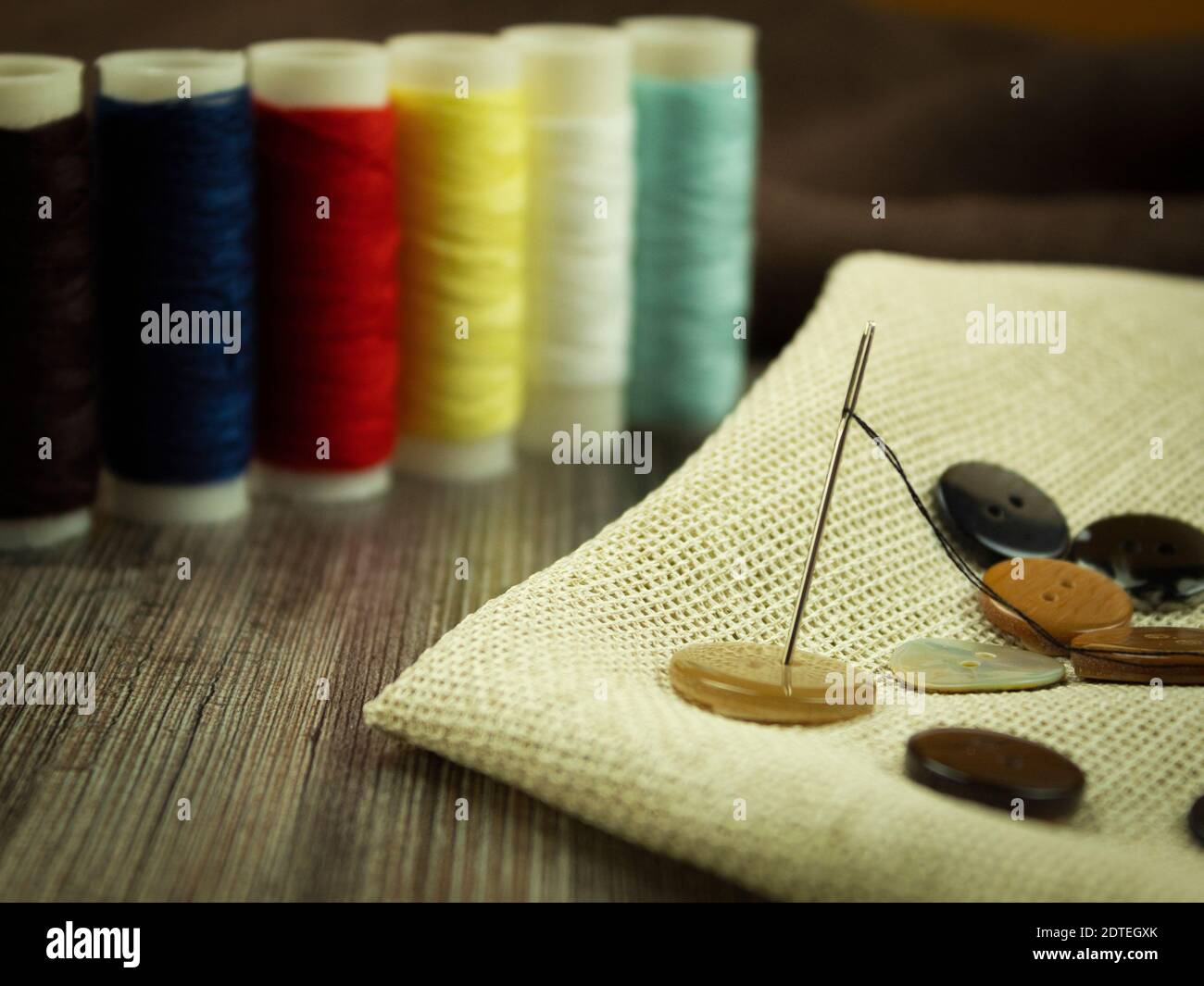Thread with a needle hi-res stock photography and images - Alamy