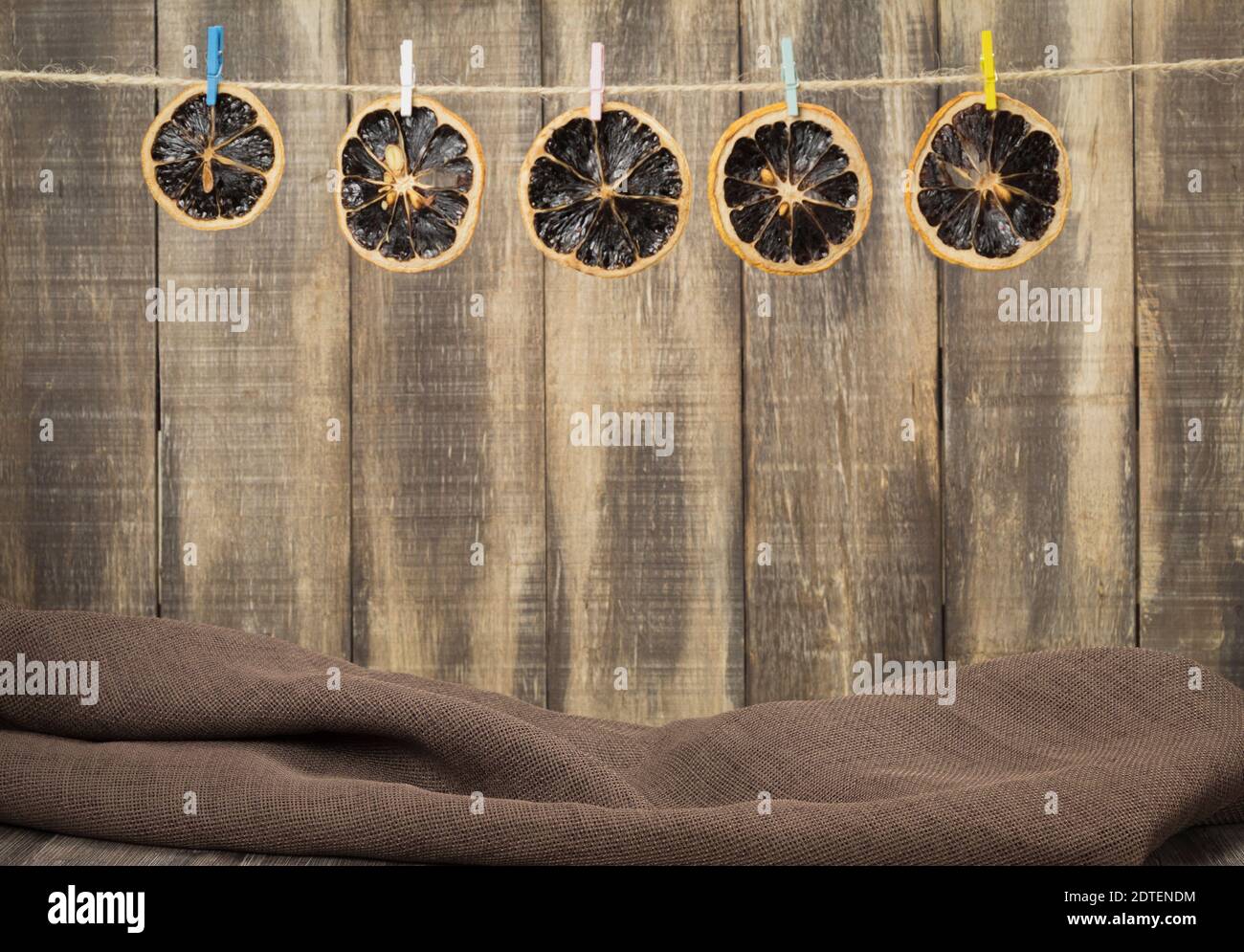 Dry lemon slices on a rope Stock Photo - Alamy