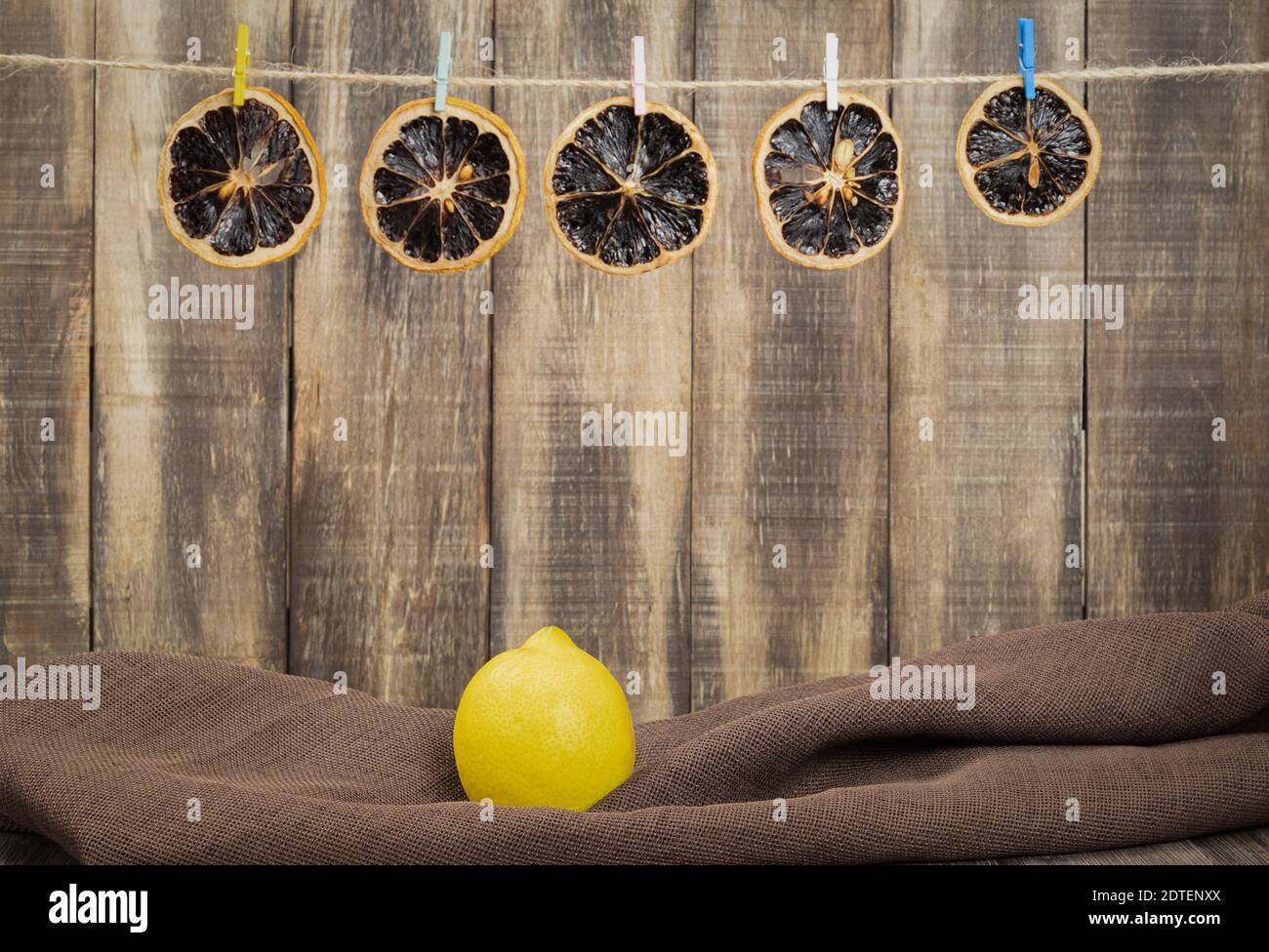 Dry lemon slices on a rope Stock Photo - Alamy