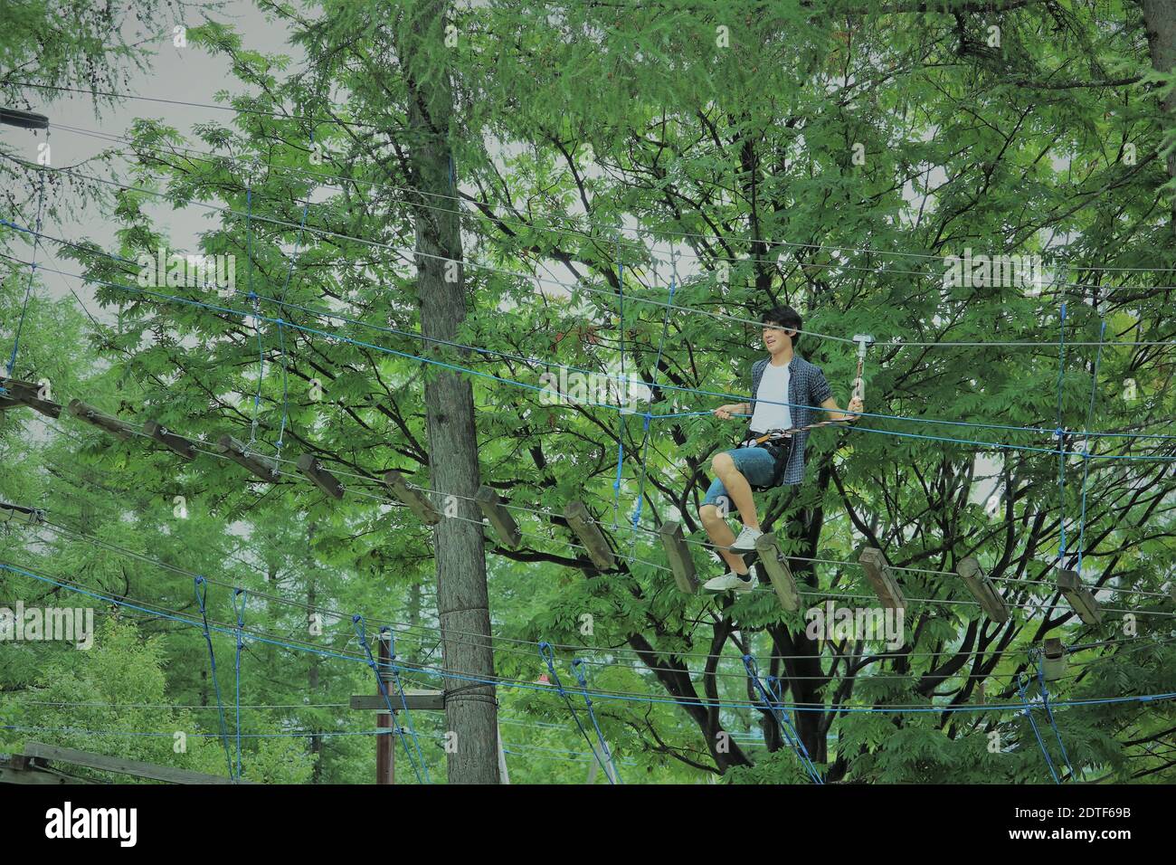Child zip lining hi-res stock photography and images - Alamy
