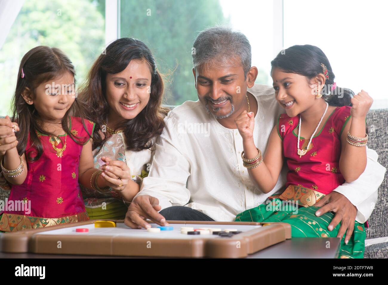 Children playing carrom hi-res stock photography and images - Alamy