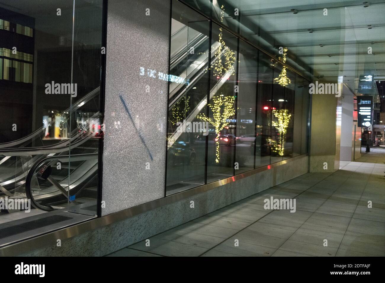 Seattle, USA. 12th Dec, 2020. A smashed window in the new Rainier ...