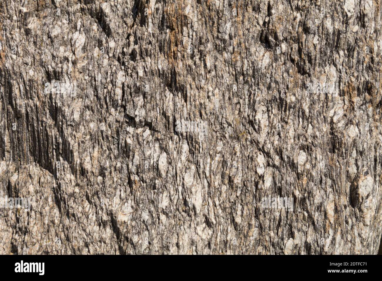 Natural texture of granite rocks and stones. Relief texture of granite ...
