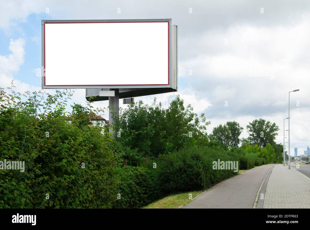 Banner for text on the background of a city street. Cycle path and ...