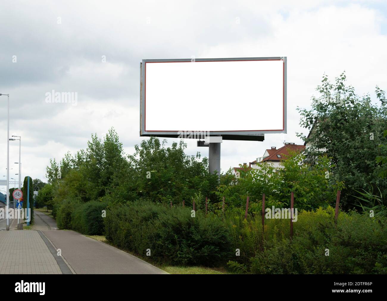 Banner for text on the background of a city street. Cycle path and ...