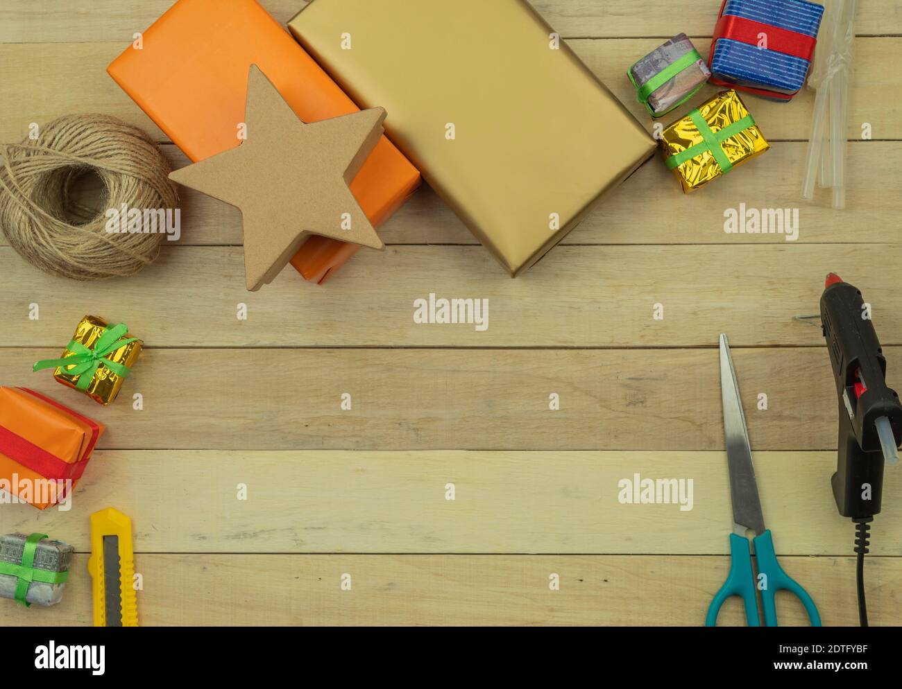 Manual gift wrapping in gift paper. Background gift box and paper for ...