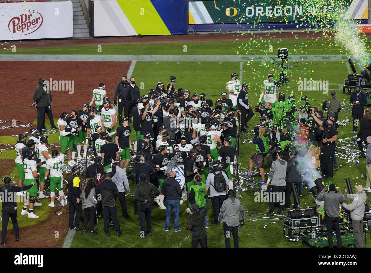 Oregon Ducks players celebrate winning the Pac-12 Championship after an ...