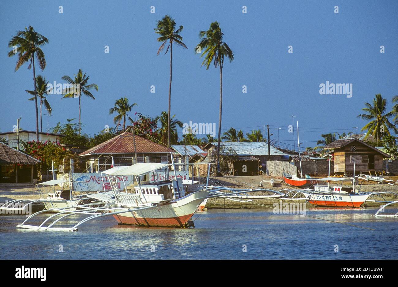 Traditional Filipino outrigger fishing boats - known as 'bangka' boats ...