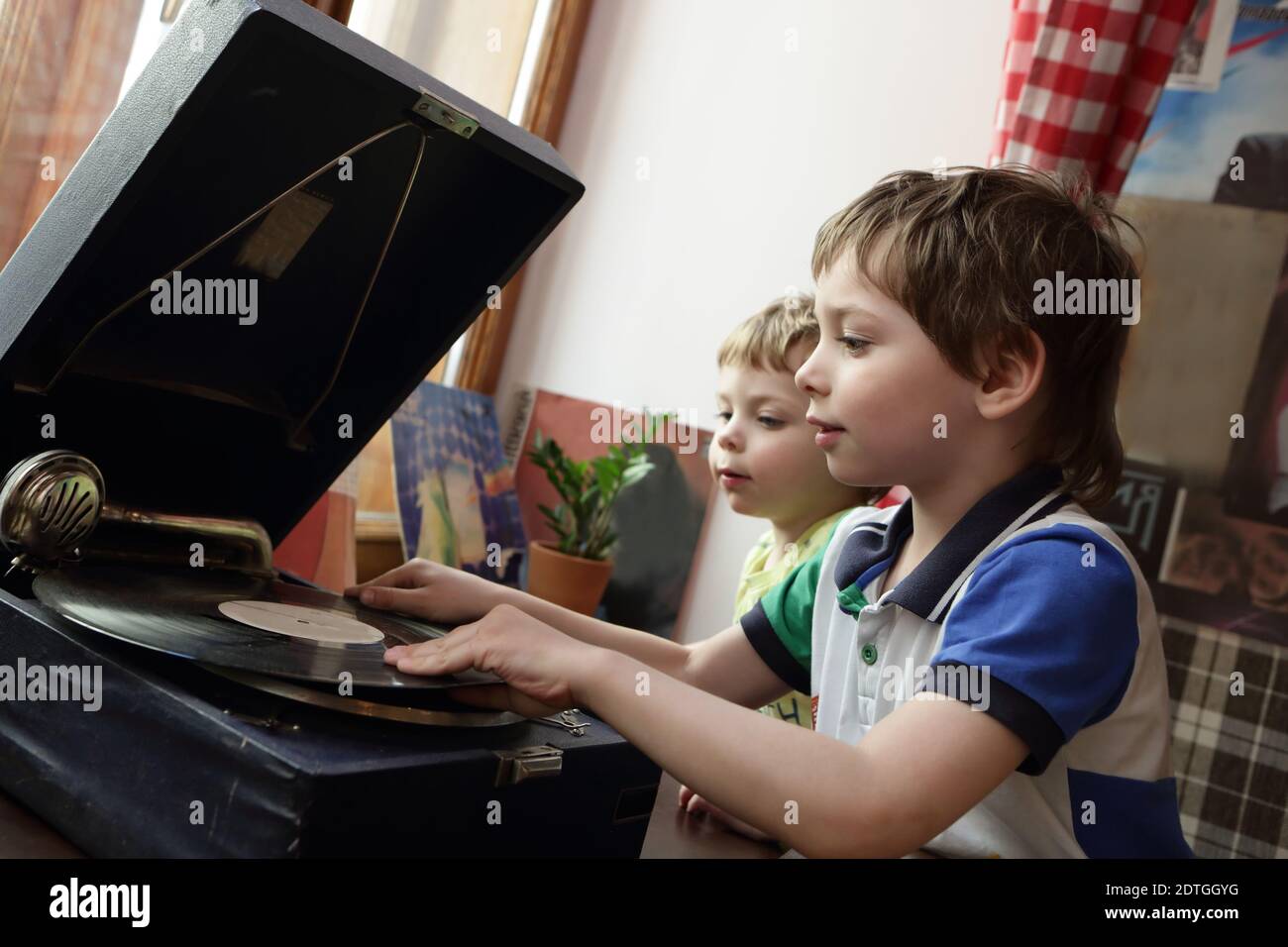 Children playing with gramophone in a museum Stock Photo - Alamy