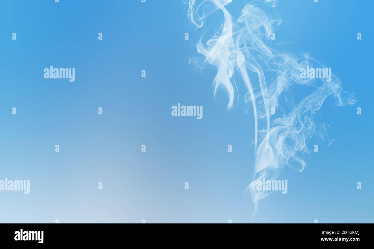 White wipe smoke cloud on sky blue. Abstract mystic freeze motion ...