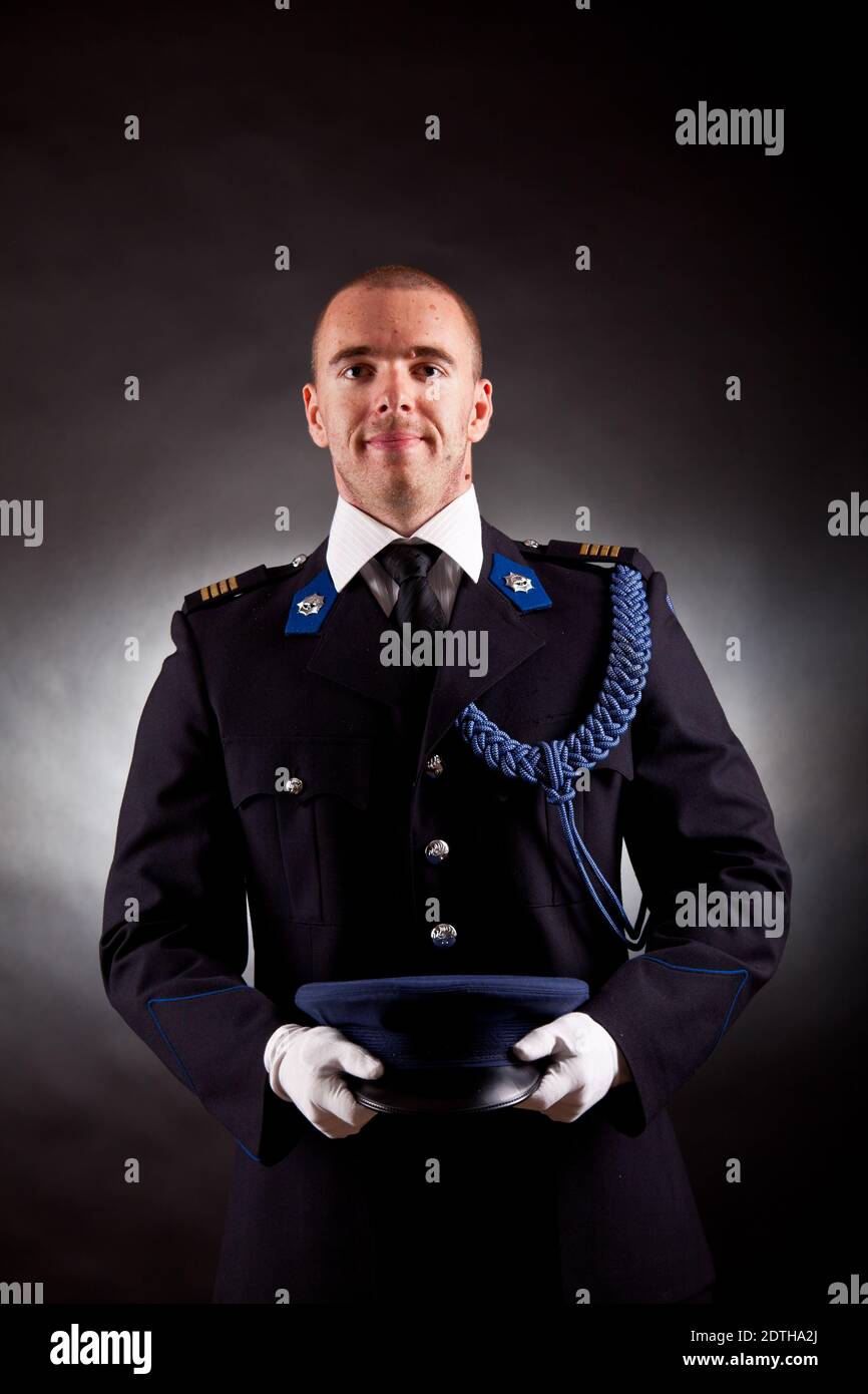 elegant soldier wearing uniform in studio Stock Photo - Alamy