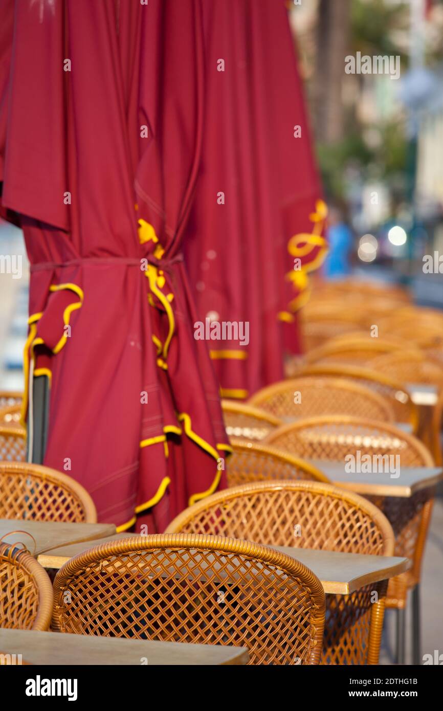 Beach cafe with table and chairs in Menton Stock Photo - Alamy