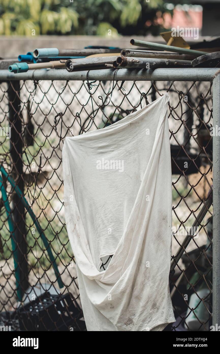 Laundry hanging on fence hi-res stock photography and images - Alamy