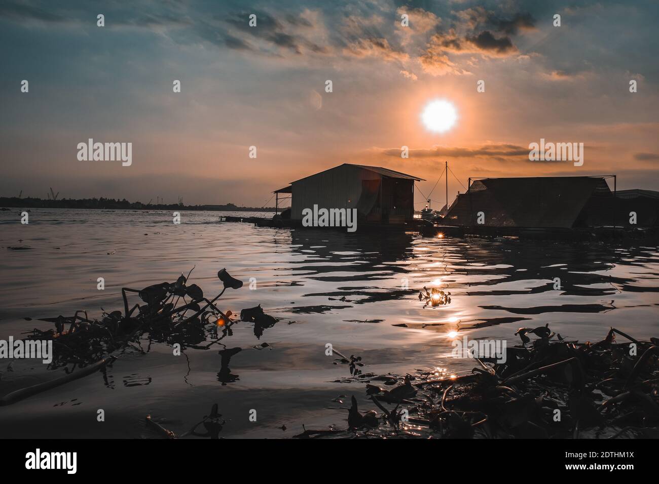 Cinematic scenery of the sunset over the Mekong Delta in Vietnam ...