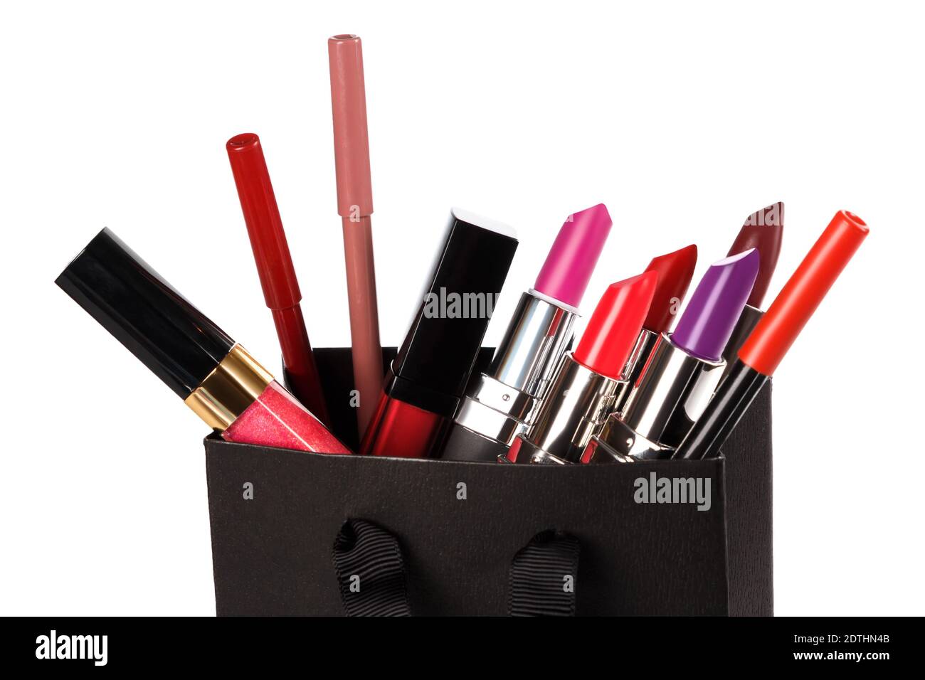 Differnt makeup objects in the shopping bag on white background Stock ...