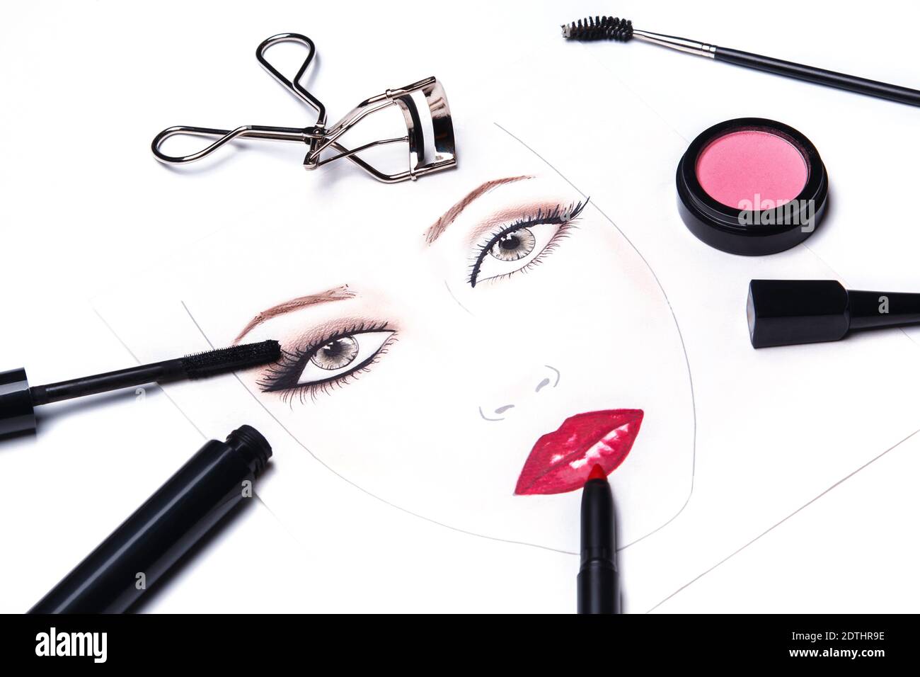 Face chart and different makeup objects and cosmetics on white ...