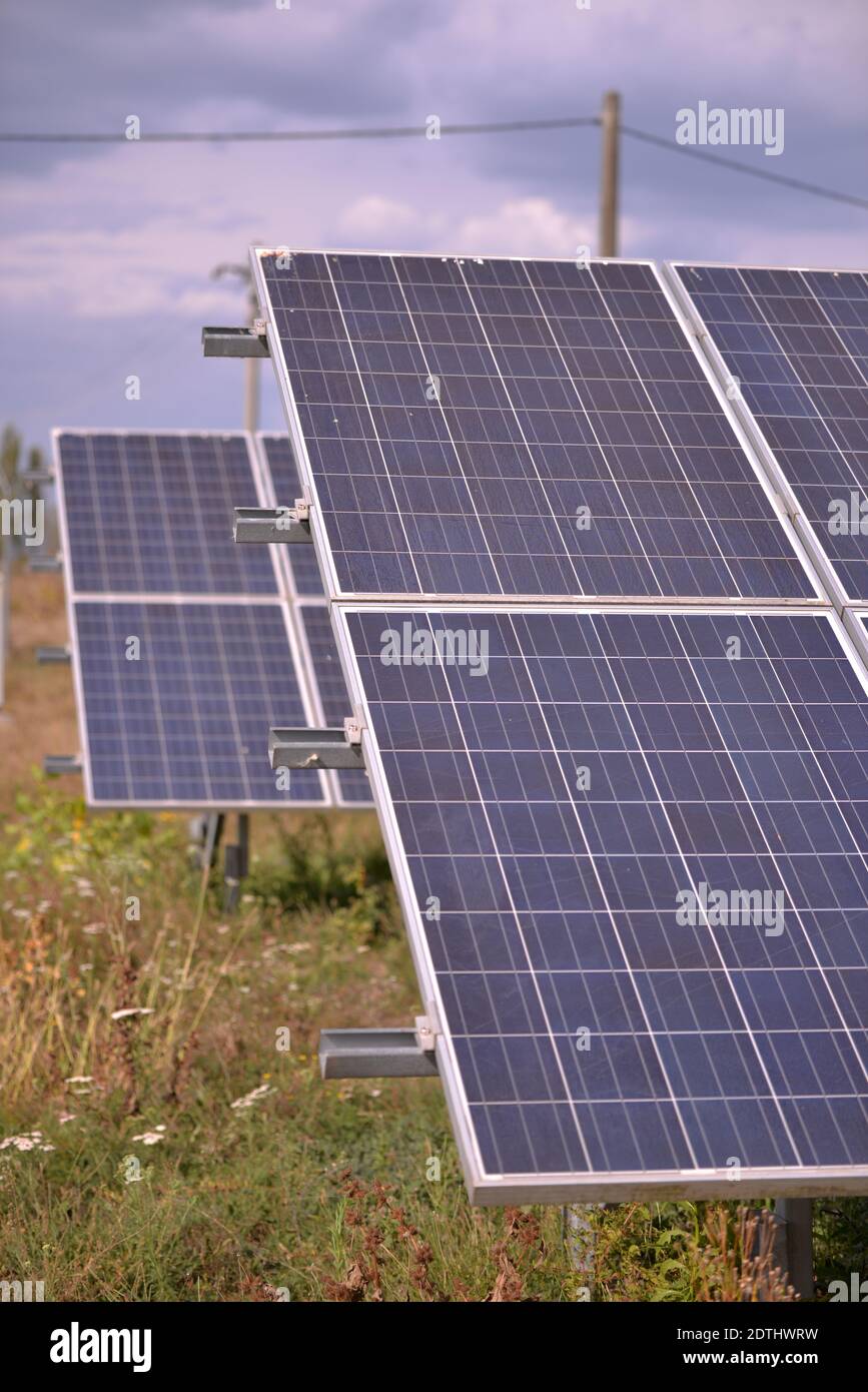 A vertical shot of solar panels - renewable energy, ecology concept ...