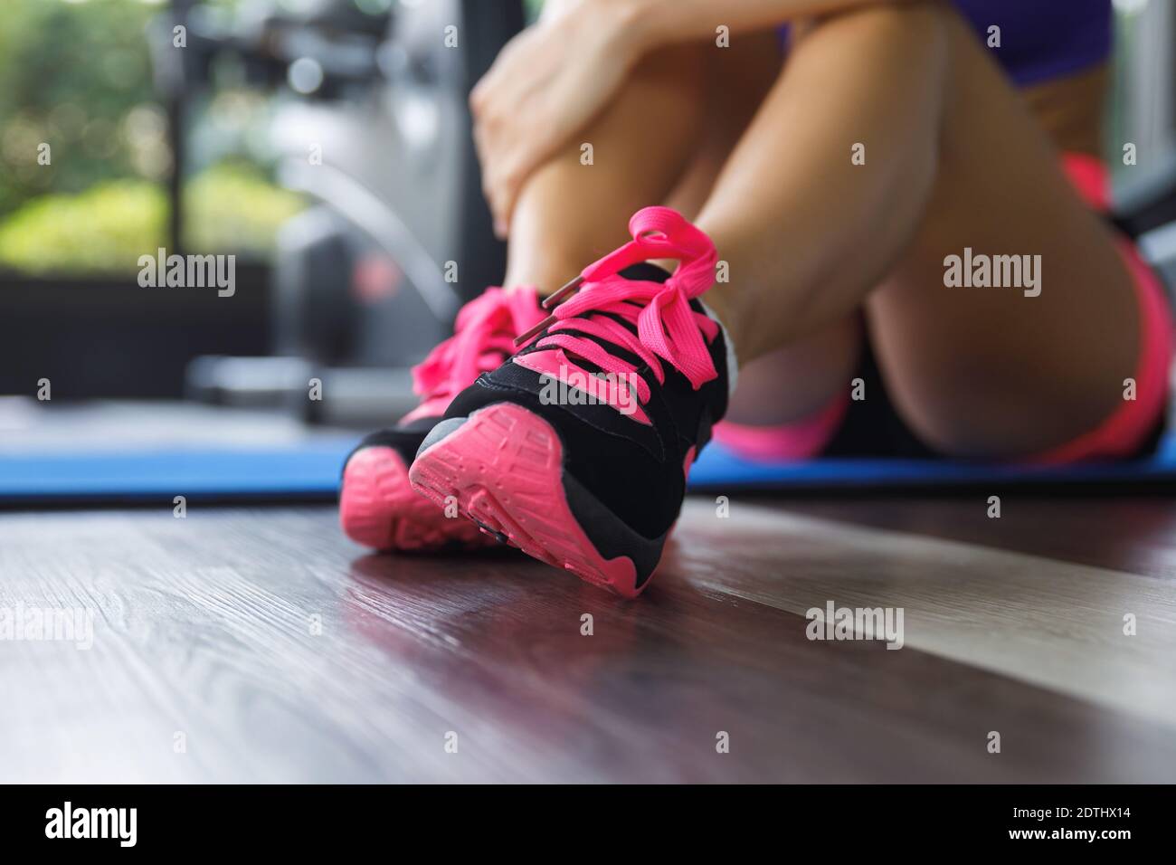 Close-up of female legs with a sneakers in the gym Stock Photo - Alamy