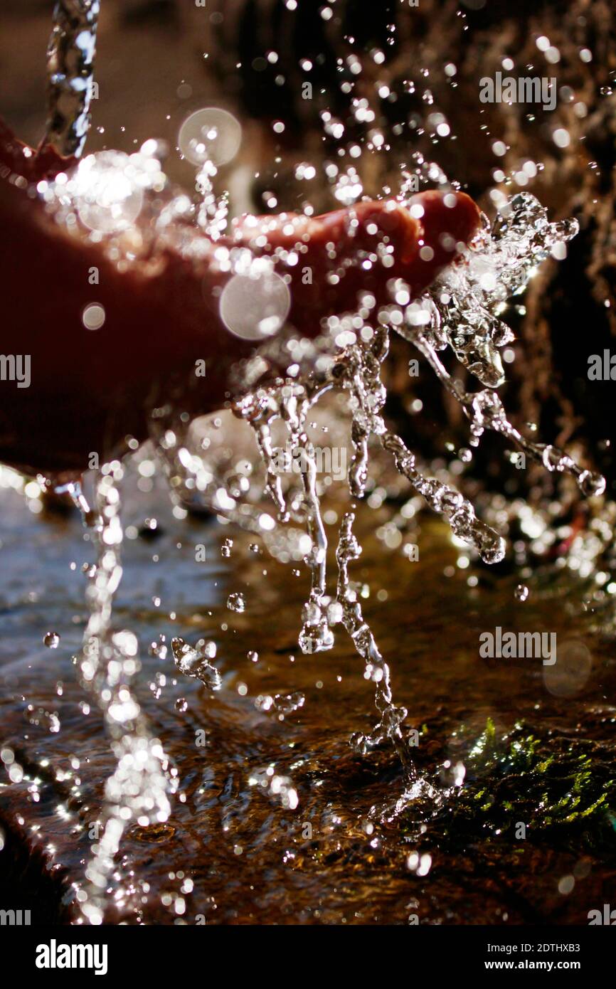 Fresh mountain waters. Drinking clean spring water Stock Photo - Alamy