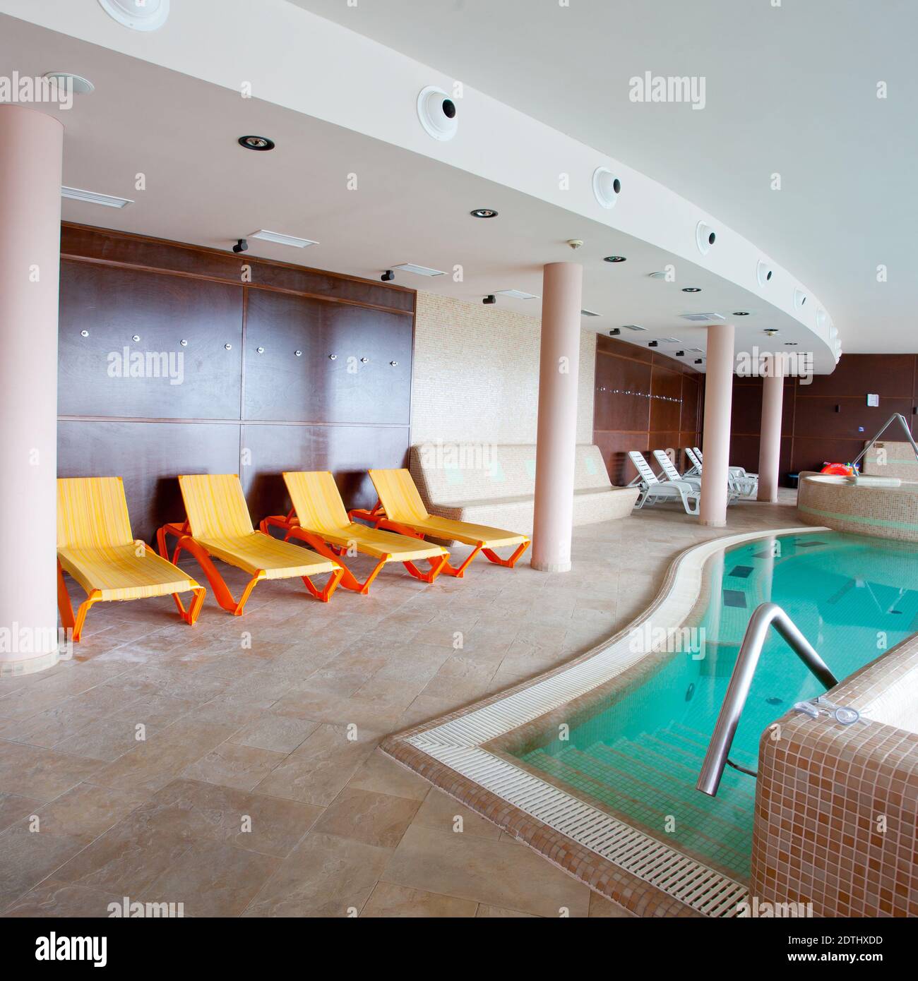 Exclusive indoor swimming pool with clear water Stock Photo - Alamy