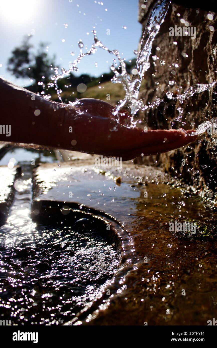 Fresh mountain waters. Drinking clean spring water Stock Photo - Alamy