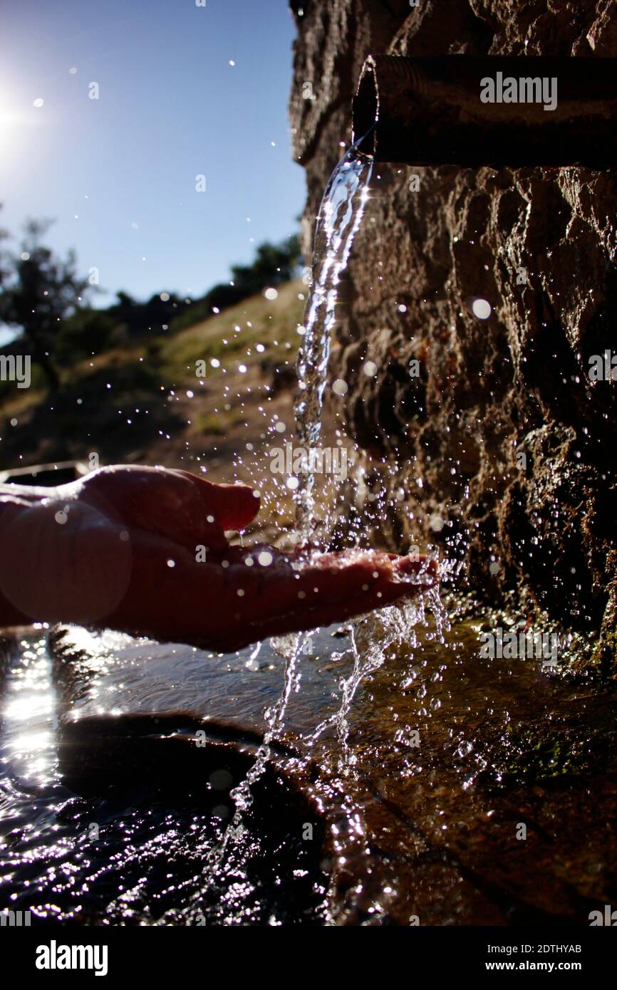Fresh mountain waters. Drinking clean spring water Stock Photo - Alamy