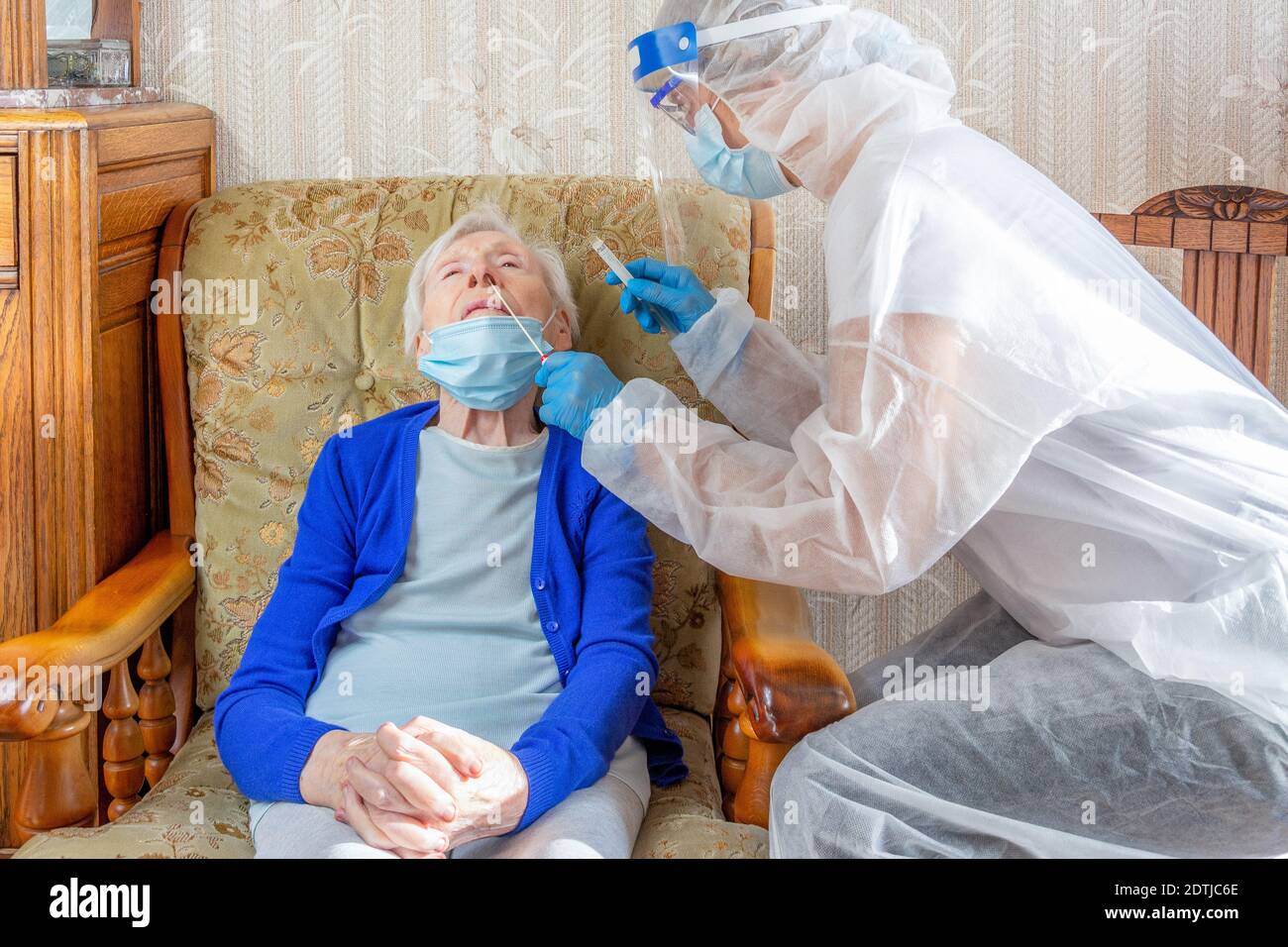 PCR test at home, on the elderly Stock Photo - Alamy