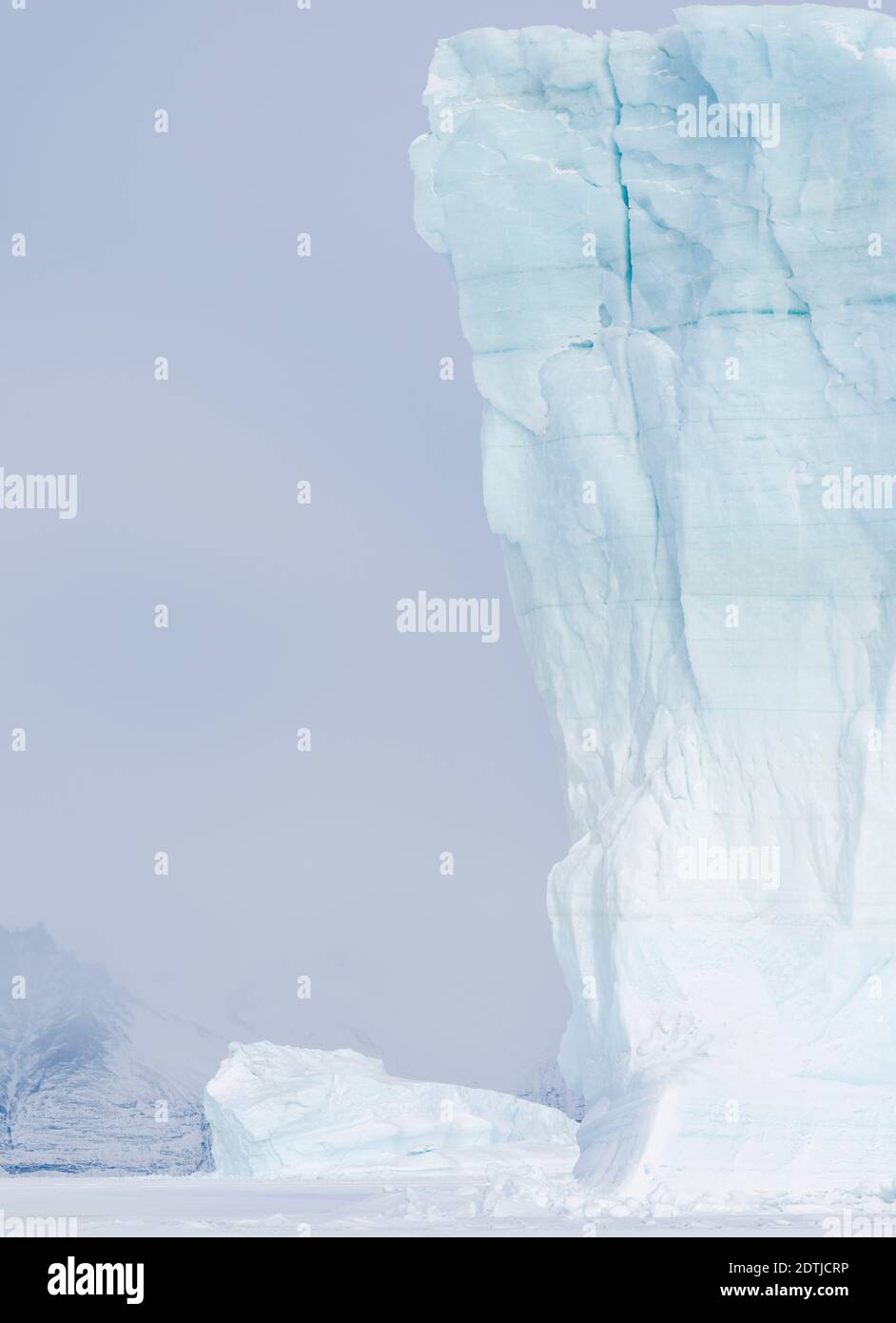 Icebergs frozen into the sea ice of the Uummannaq Fjordsystem during ...