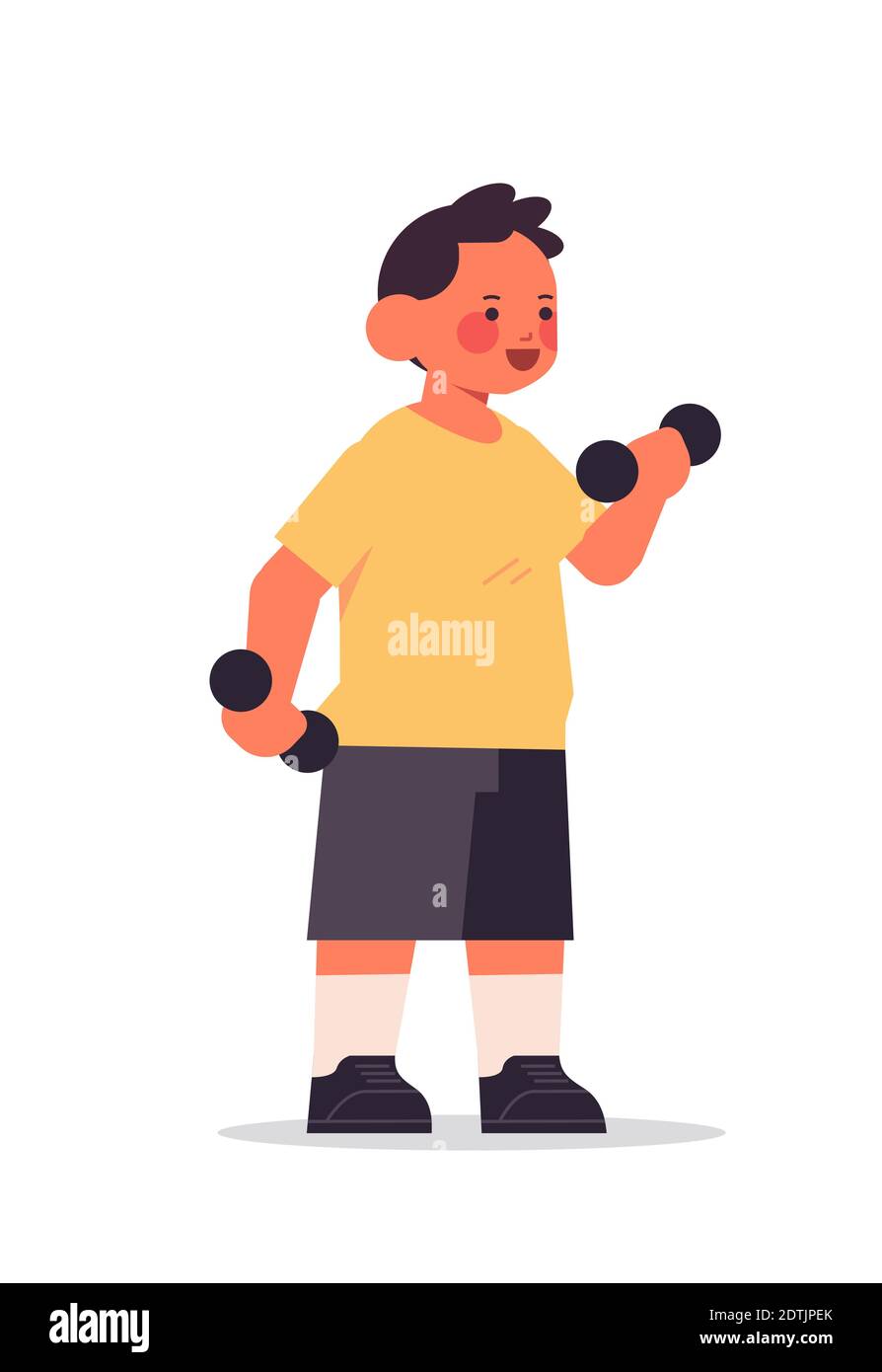 little boy doing physical exercises with dumbbells healthy lifestyle ...