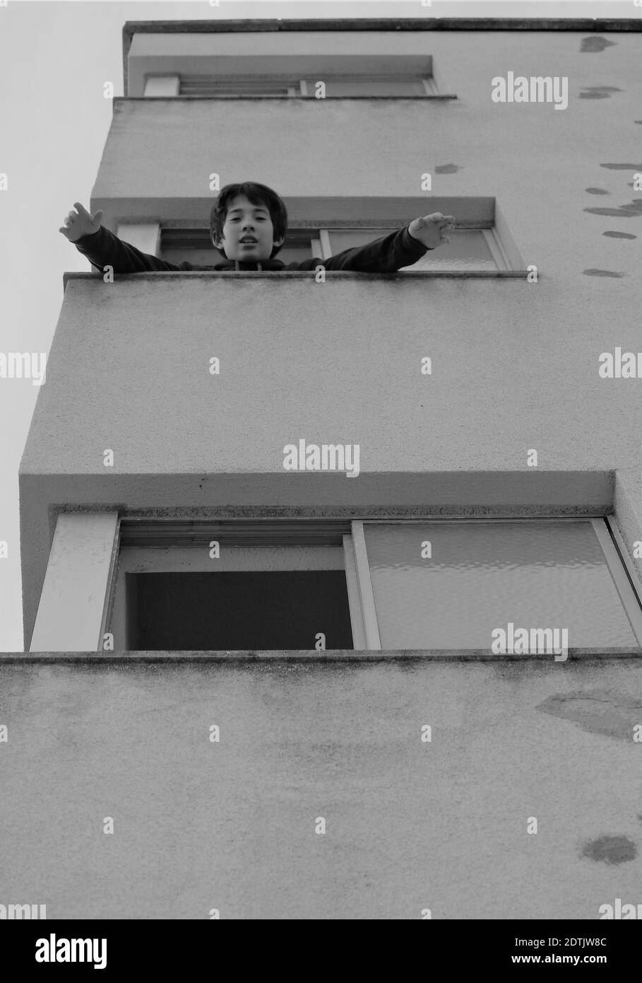 Looking out of high rise window Black and White Stock Photos & Images ...