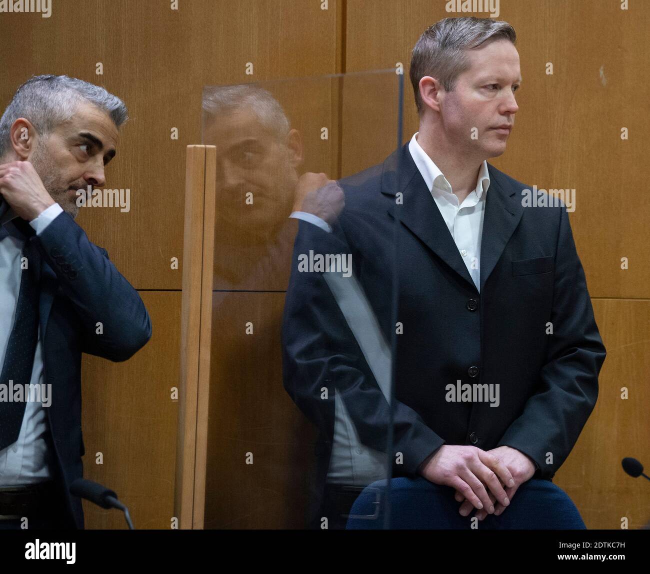 22 December 2020, Hessen, Frankfurt/Main: The main defendant Stephan Ernst (r) stands behind the ...