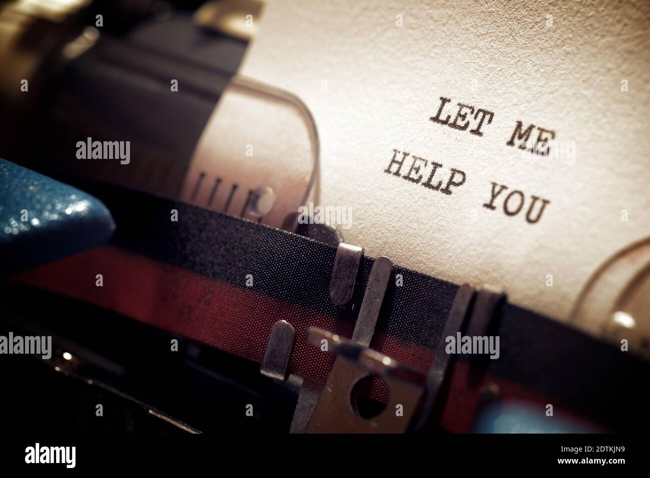 Let me help you phrase written with a typewriter Stock Photo - Alamy