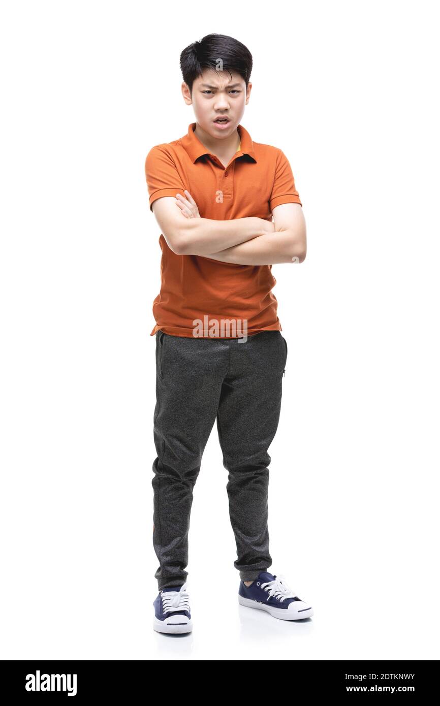 Angry boy arms crossed Cut Out Stock Images & Pictures - Alamy