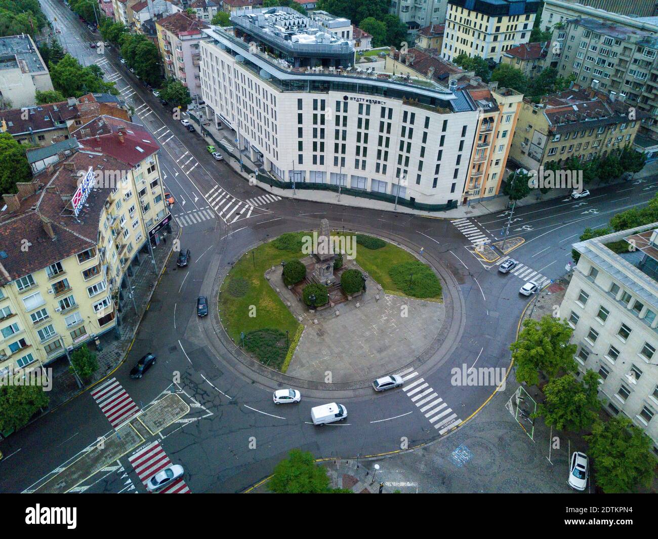 An aerial shot of buildings around a square in a small town Stock Photo ...