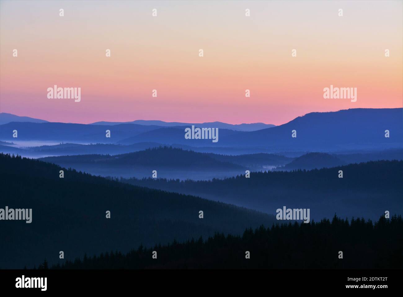 A landscape of hill silhouettes during a beautiful sunset - great for ...