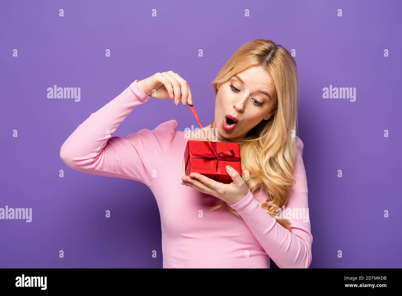 Excited young woman greeting hi-res stock photography and images - Alamy