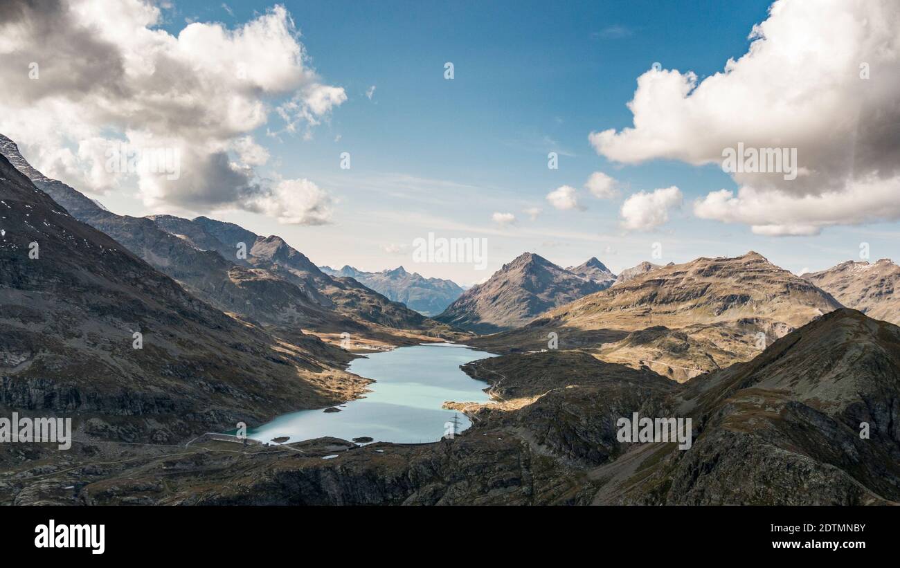 Aerial view of Lago Bianco at the Bernina Pass in the afternoon in ...