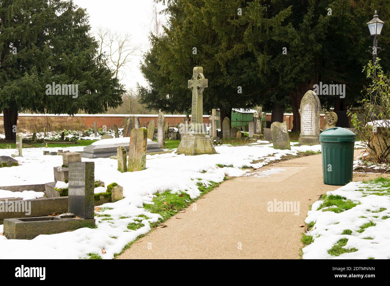 Church path cleared of snow Stock Photo - Alamy