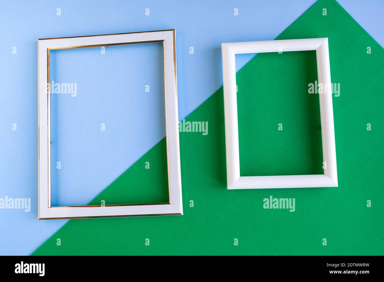 Two photo frames on color geometric background, copy space for the text ...